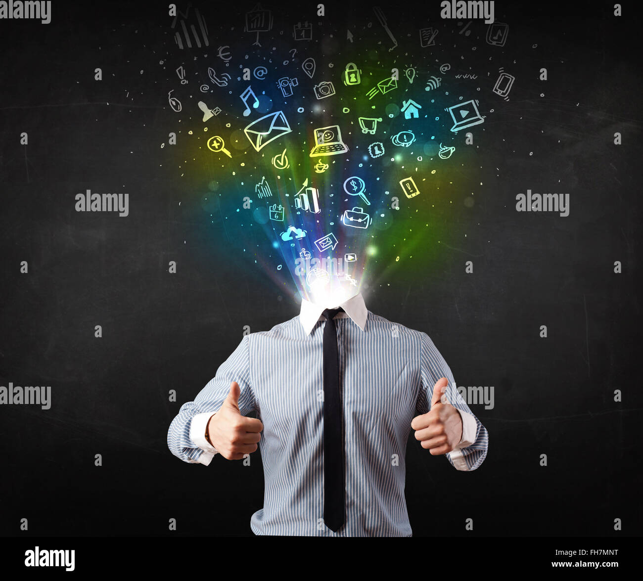Business man with glowing media icons exploding head Stock Photo - Alamy
