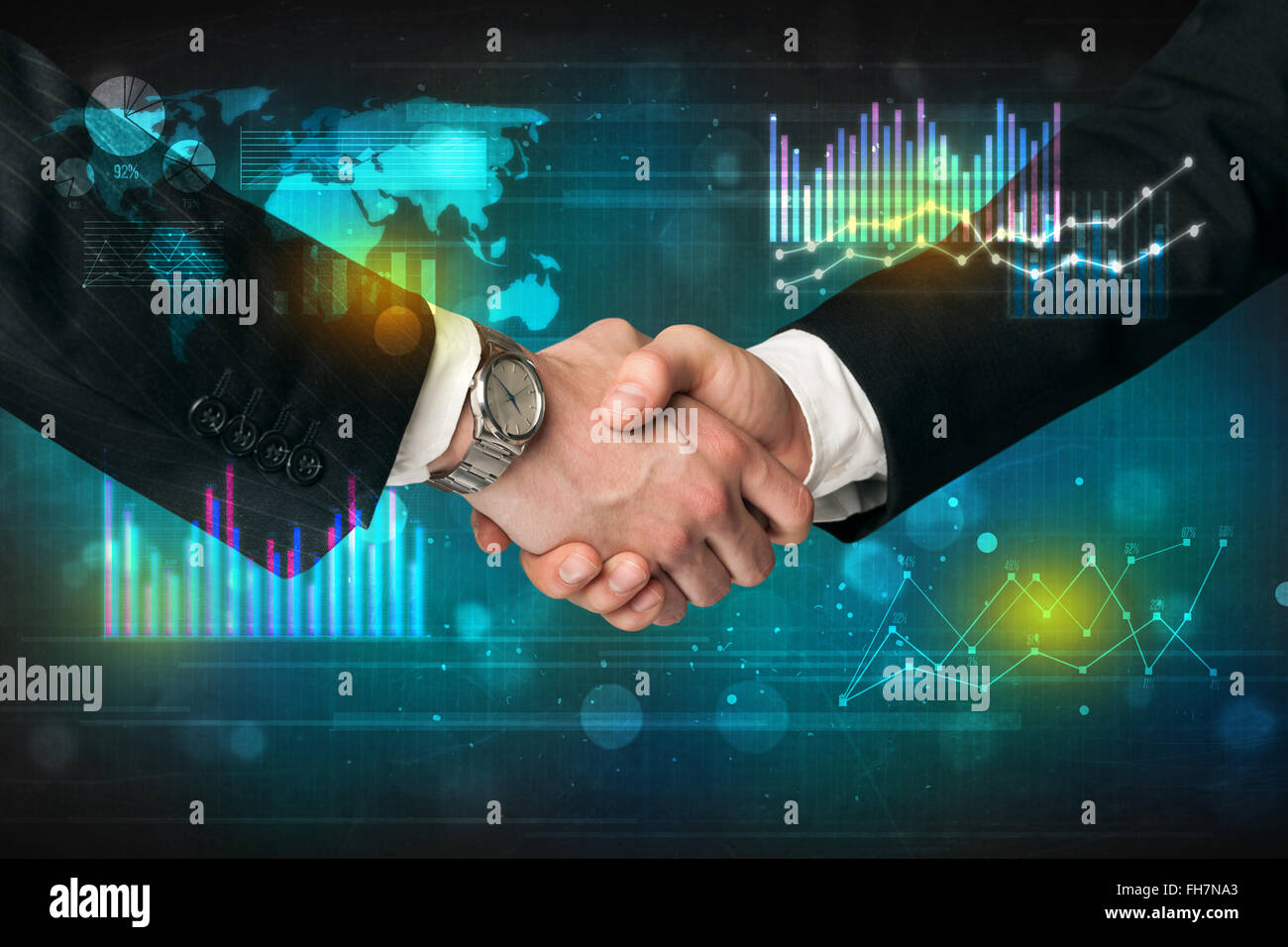 Handshake with diagrams Stock Photo - Alamy