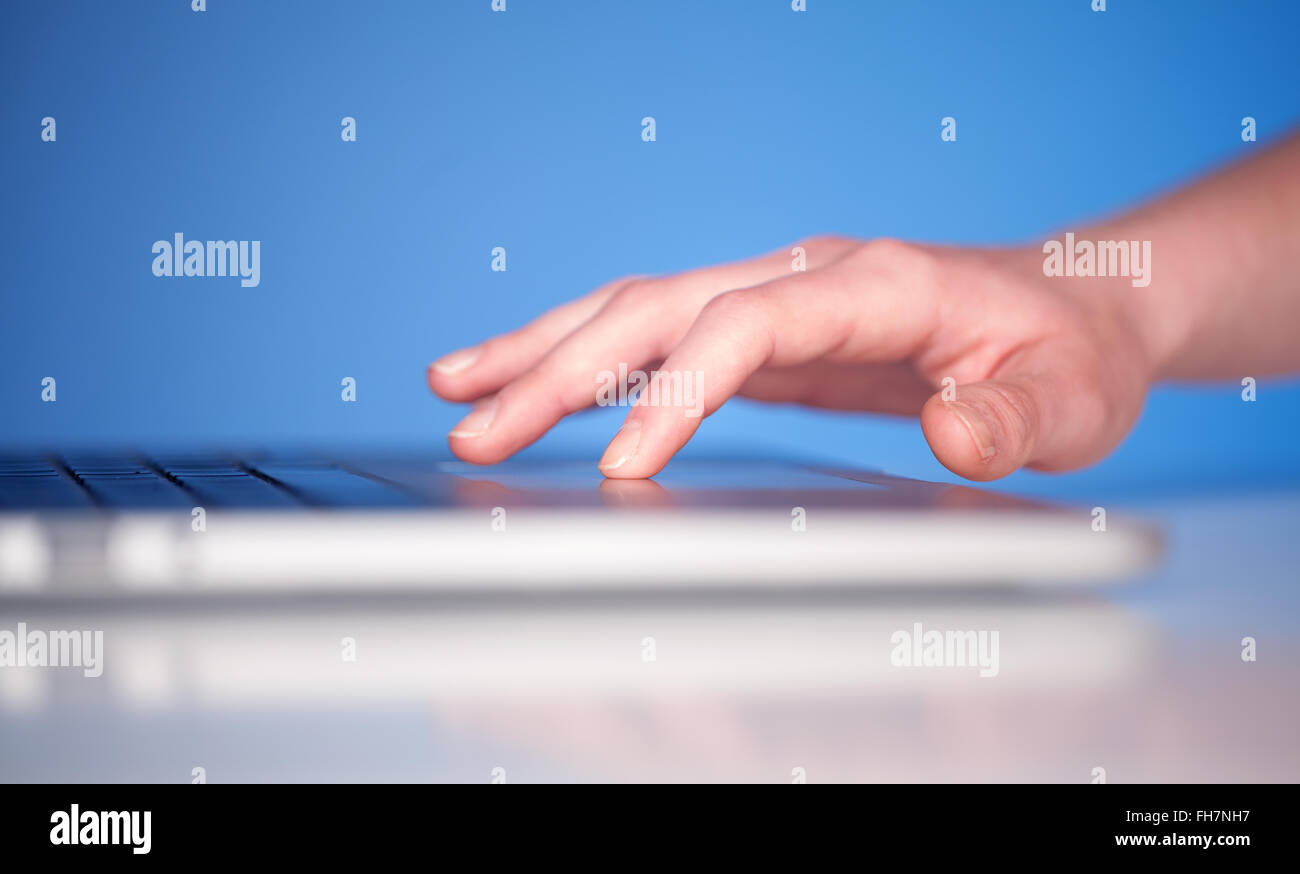 Close up of hand pressing keyboard buttons Stock Photo - Alamy