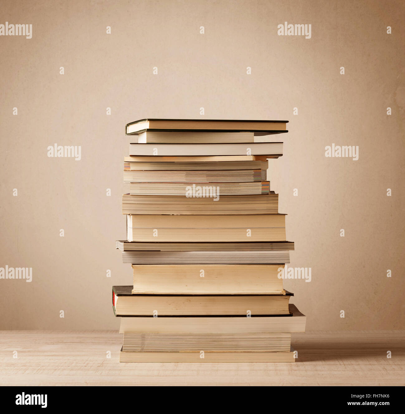A stack of books with vintage background Stock Photo - Alamy