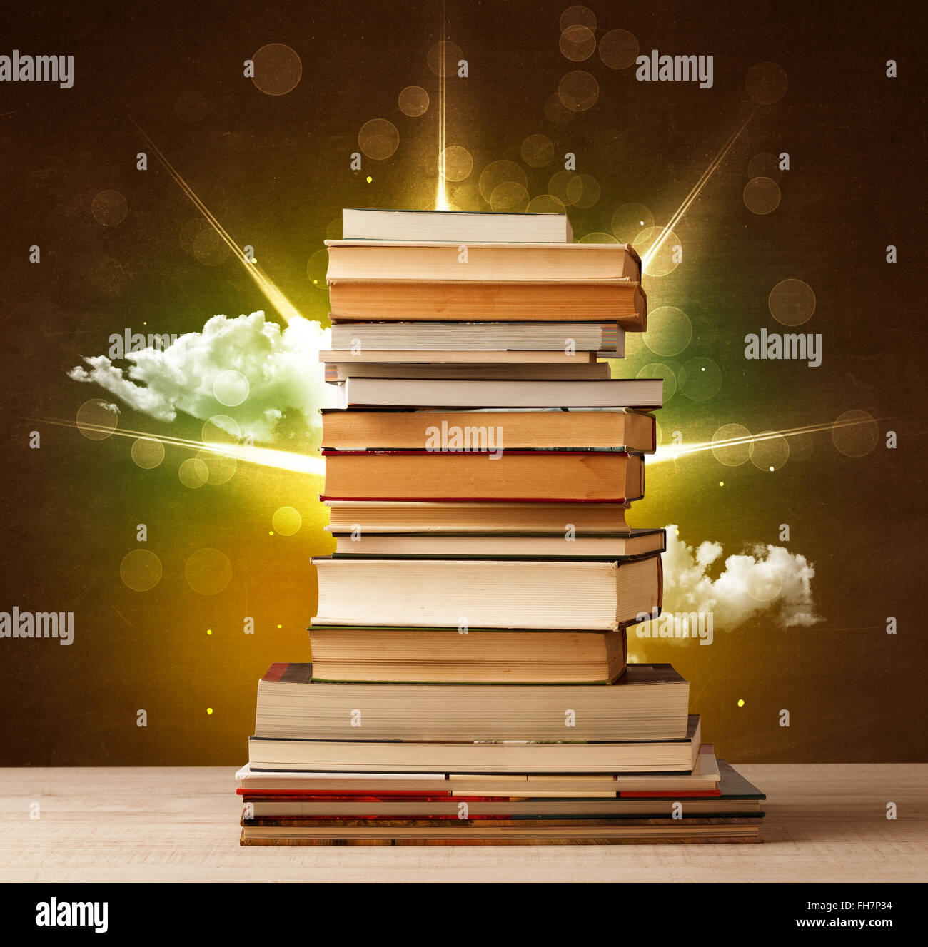 Magical books with ray of magical lights and colorful clouds Stock ...