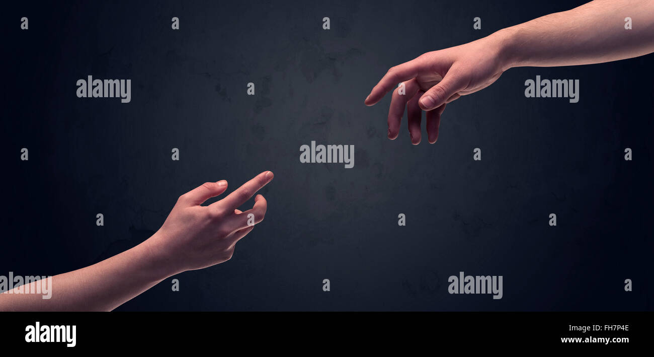 Hand about to touch another one Stock Photo - Alamy