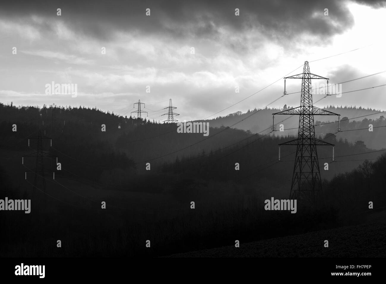 Electricity pylons in devon Black and White Stock Photos & Images - Alamy