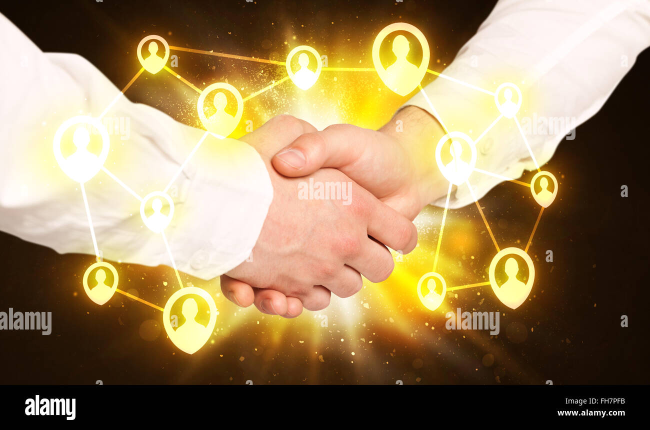 Social netwok connection handshake Stock Photo - Alamy