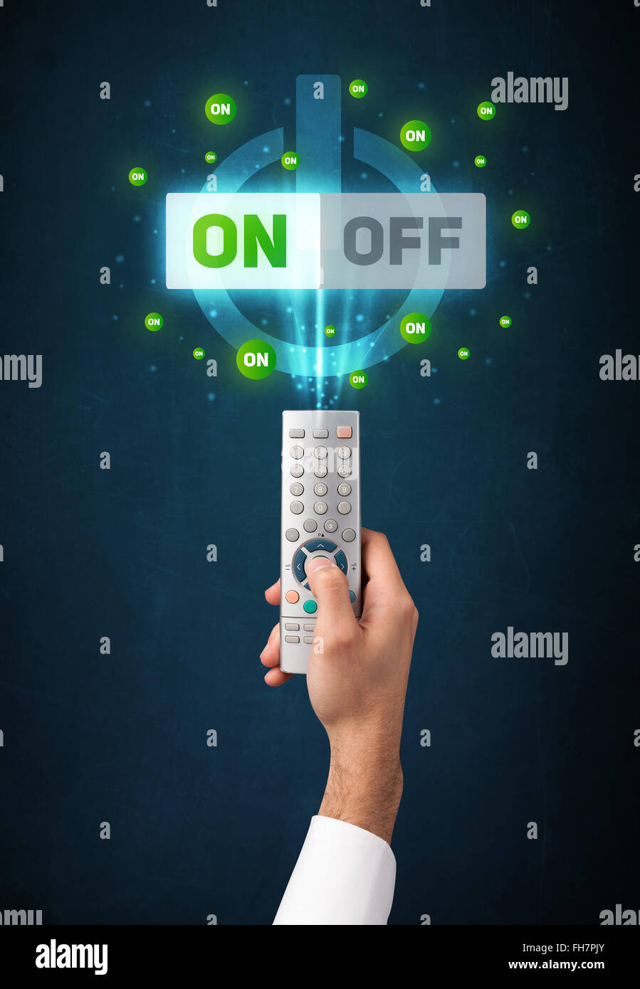 Hand with remote control and on-off signals Stock Photo - Alamy