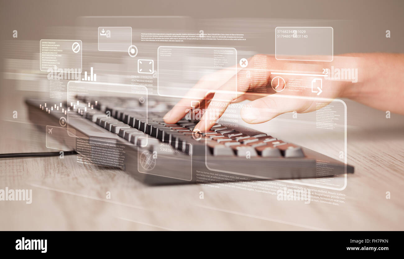 Hand touching keyboard with high tech buttons Stock Photo - Alamy