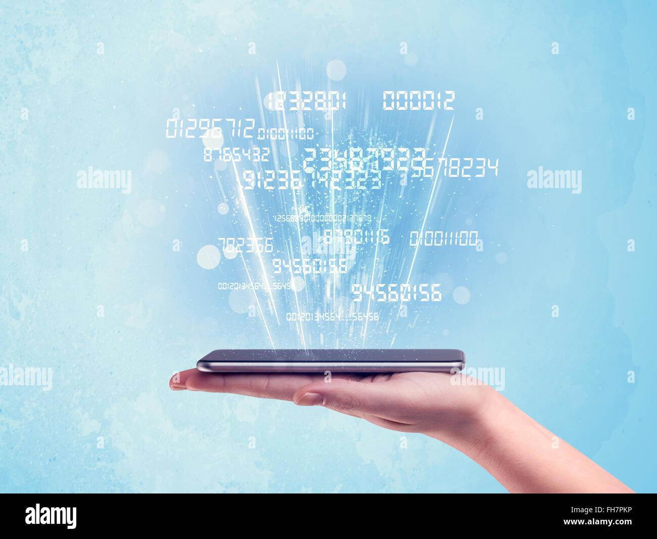 Hand holding phone with digital numbers Stock Photo - Alamy