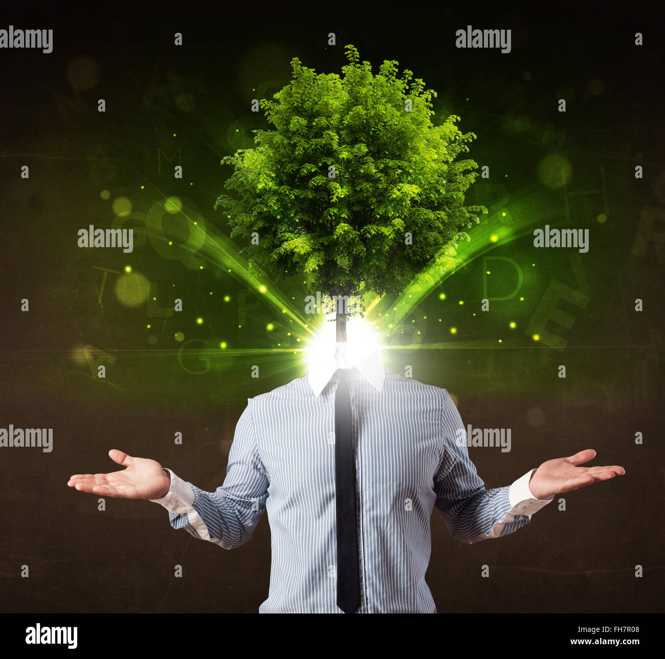 Man with green tree head concept Stock Photo - Alamy