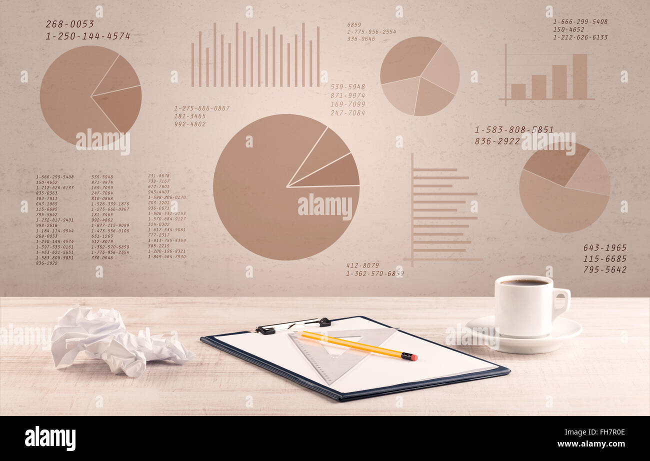 Pie chart graph office desk Stock Photo - Alamy