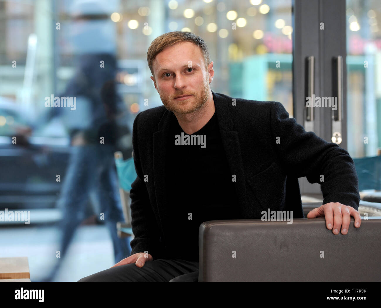 Bremen, Germany. 23rd Feb, 2016. Author Michael Nast poses ahead of a ...
