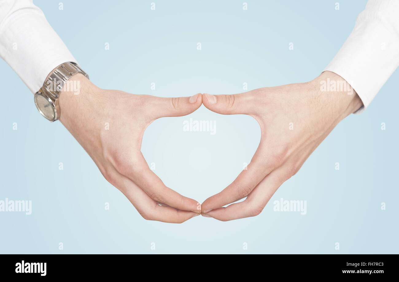 Hands creating form Stock Photo - Alamy