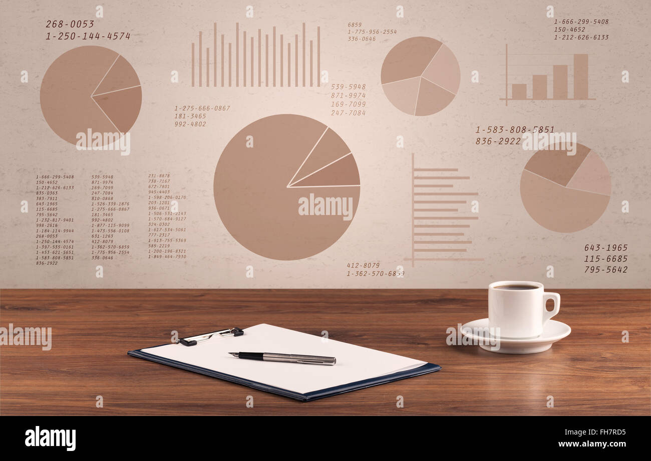 Pie chart graph office desk Stock Photo - Alamy