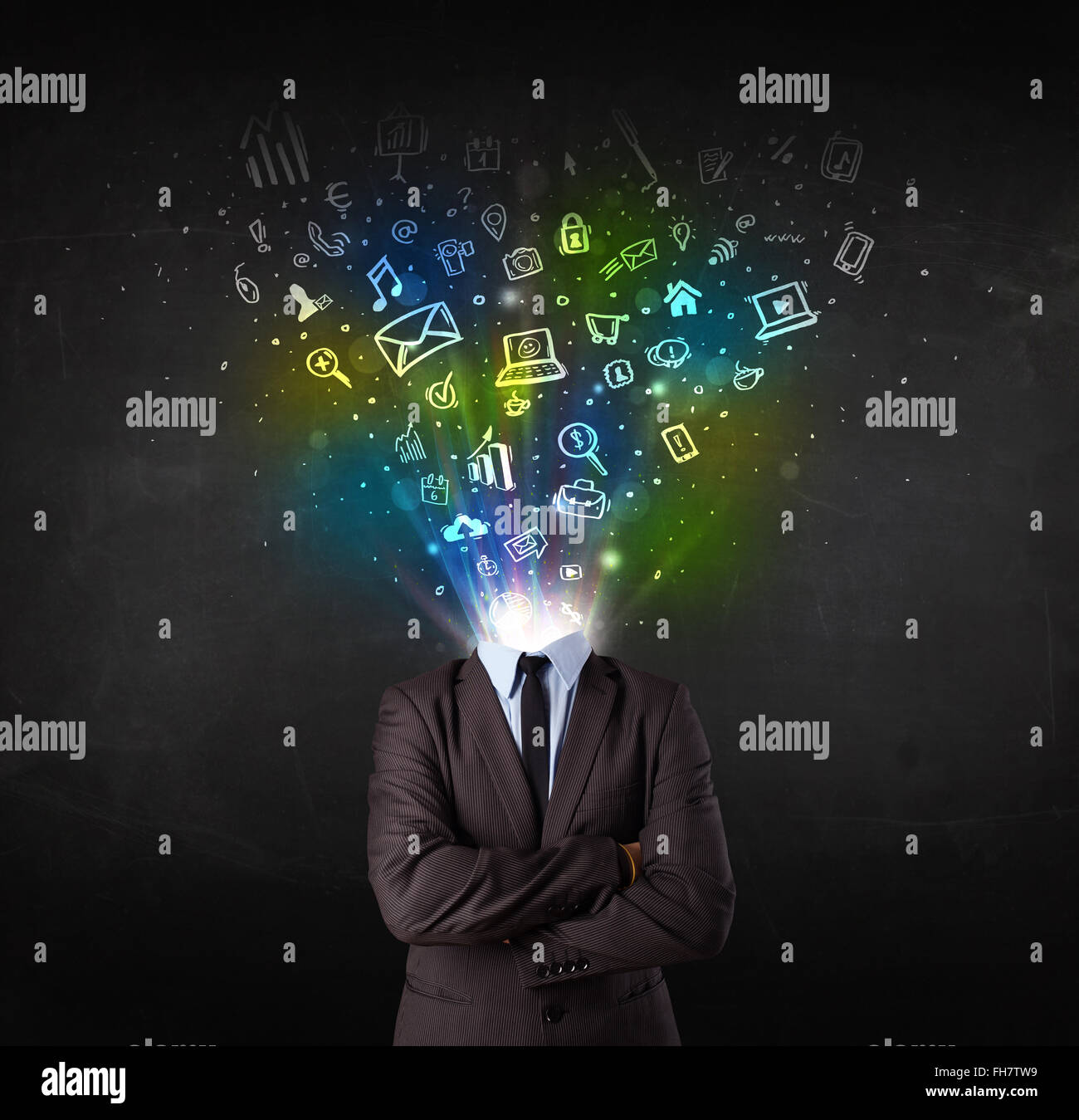 Business man with glowing media icons exploding head Stock Photo - Alamy