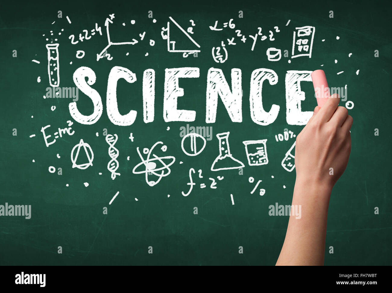 Mature science person drawing on board Stock Photo - Alamy