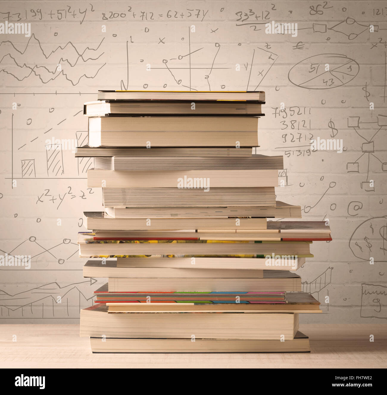 A pile of books with math formulas written in doodle style Stock Photo ...