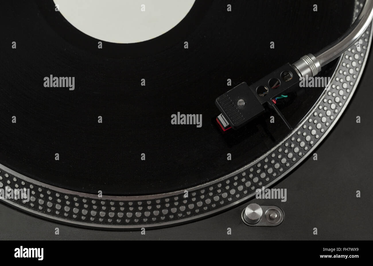 Turntable playing vinyl close up with needle on the record Stock Photo ...