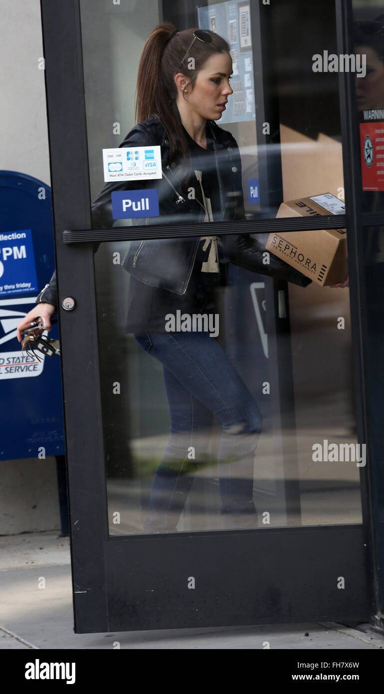 Actress Courtney B. Turk takes a package to the Post Office before ...