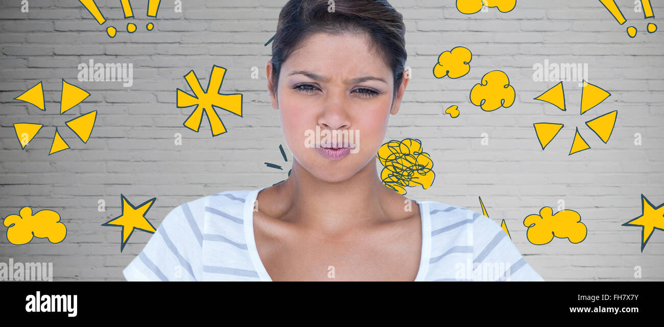 Composite image of portrait of angry woman pulling face Stock Photo - Alamy