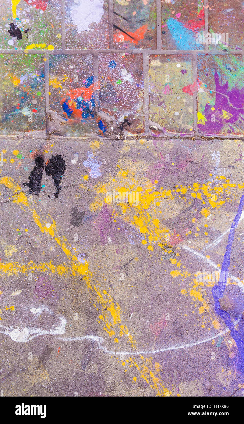 multicolor paint stains on a tile floor Stock Photo - Alamy