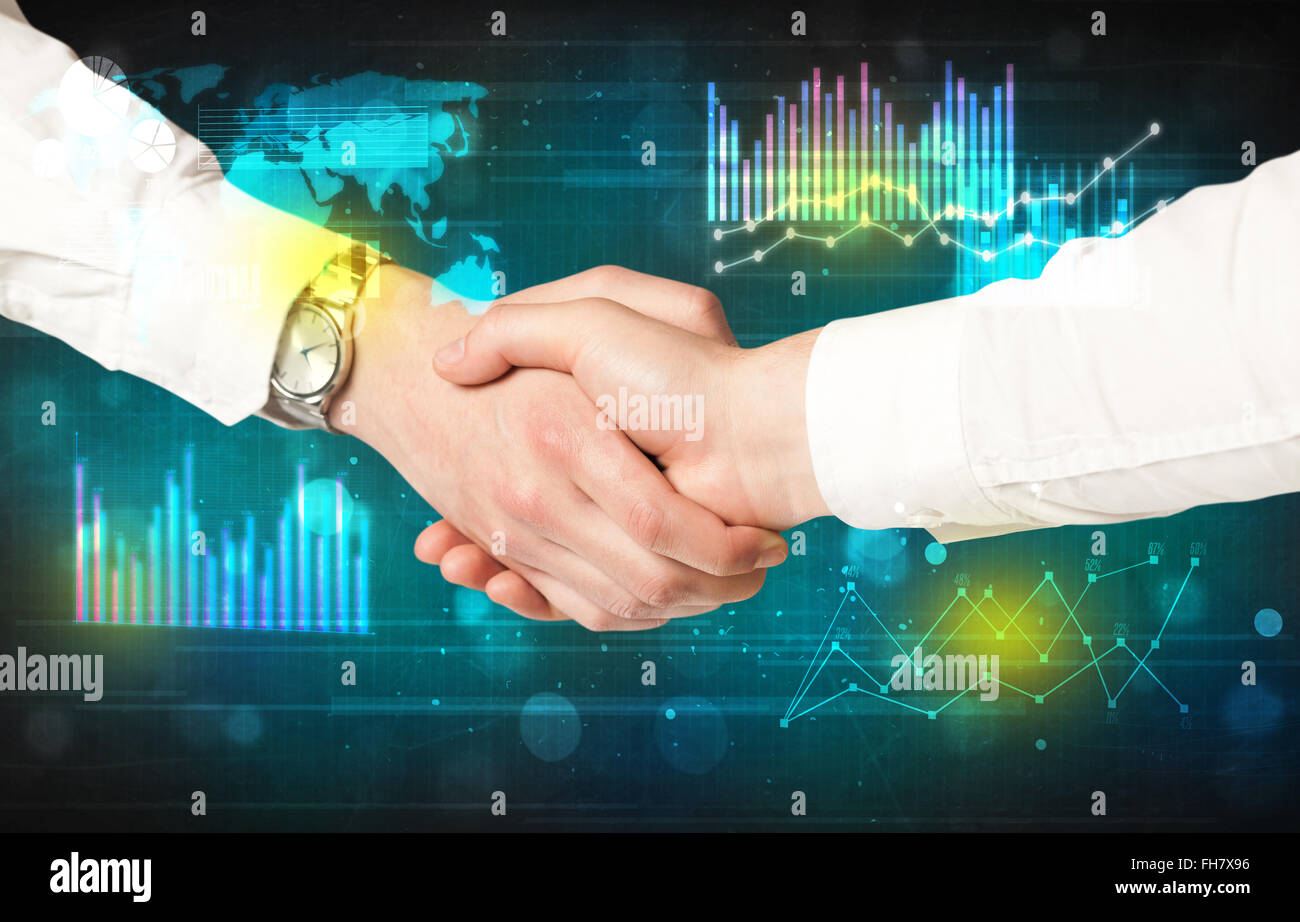 Handshake with diagrams Stock Photo - Alamy