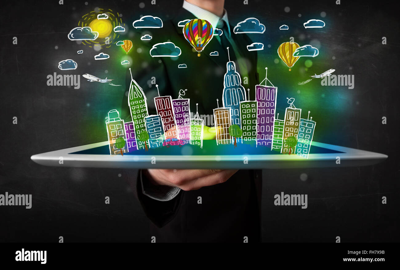 Young person showing tablet with hand drawn cityscape Stock Photo - Alamy