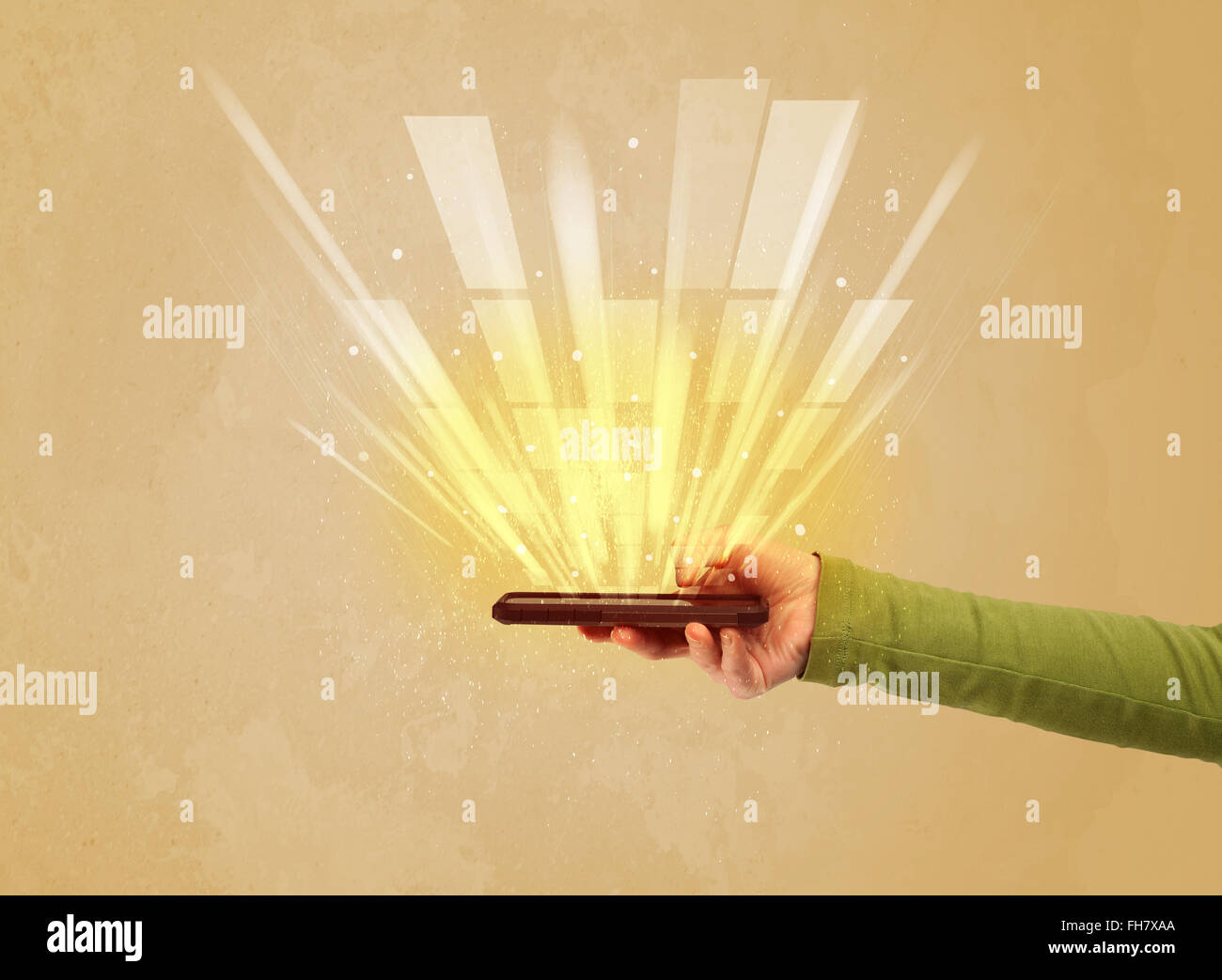 Hand with telephone and yellow light Stock Photo - Alamy