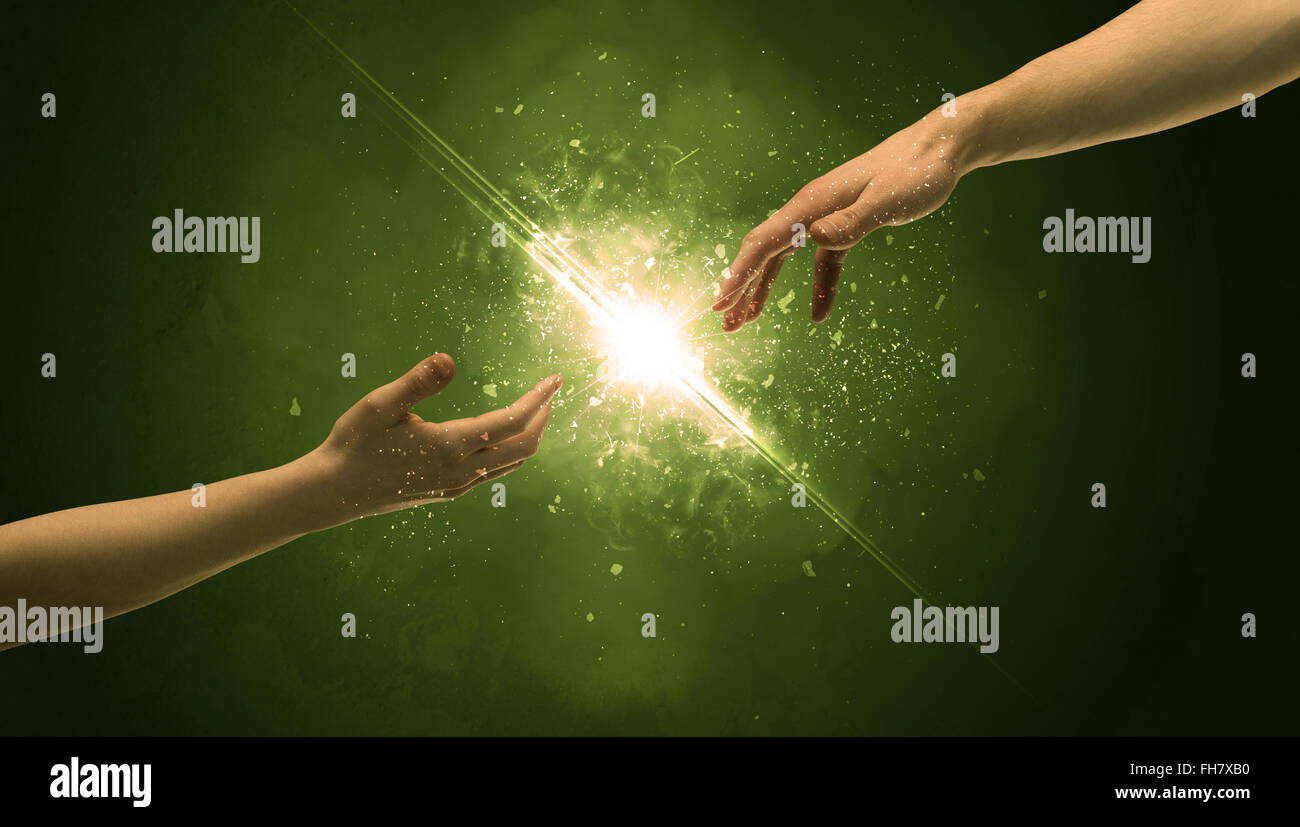 Touching arms lighting spark at fingertip Stock Photo - Alamy