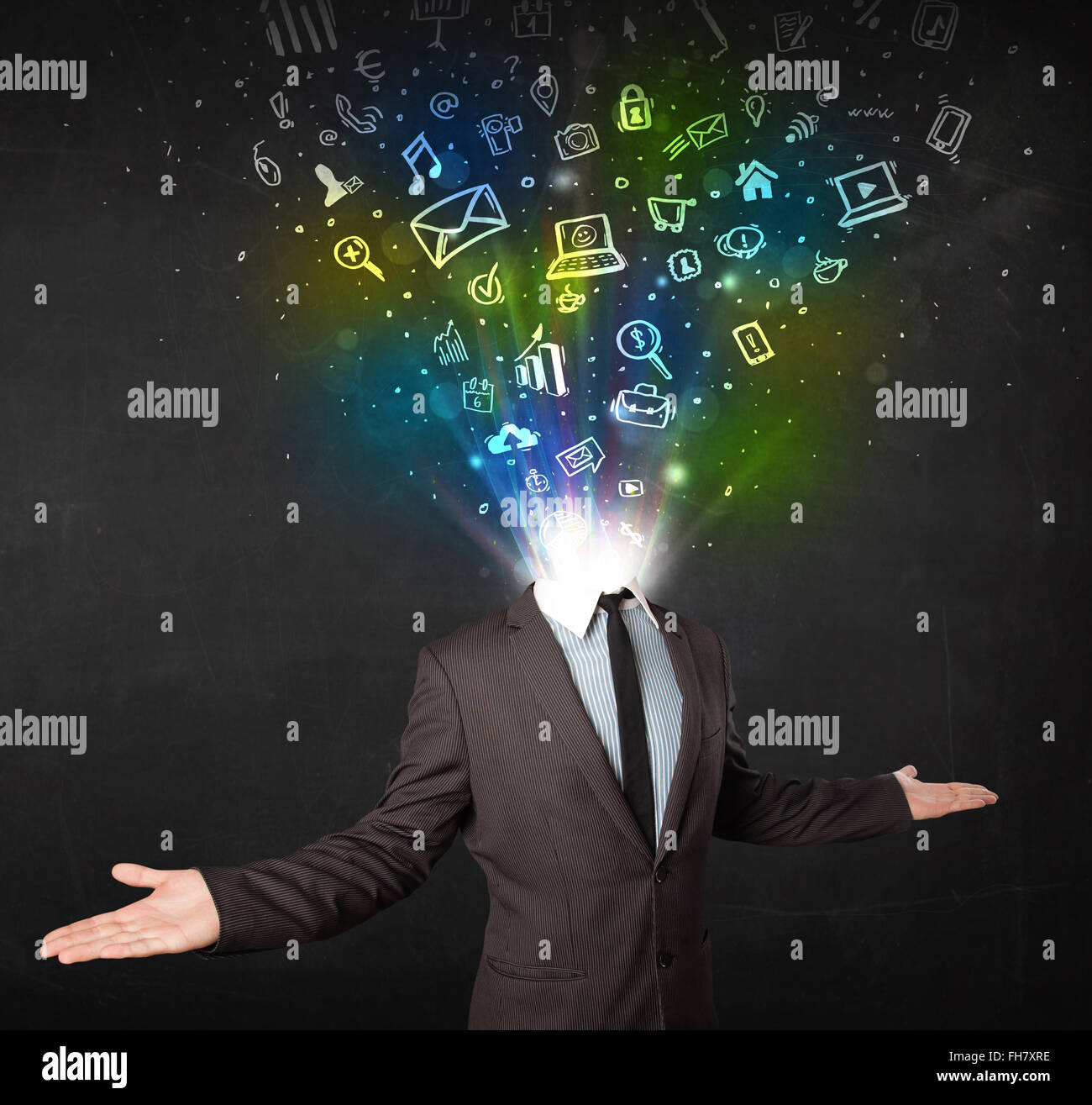Business man with glowing media icons exploding head Stock Photo - Alamy