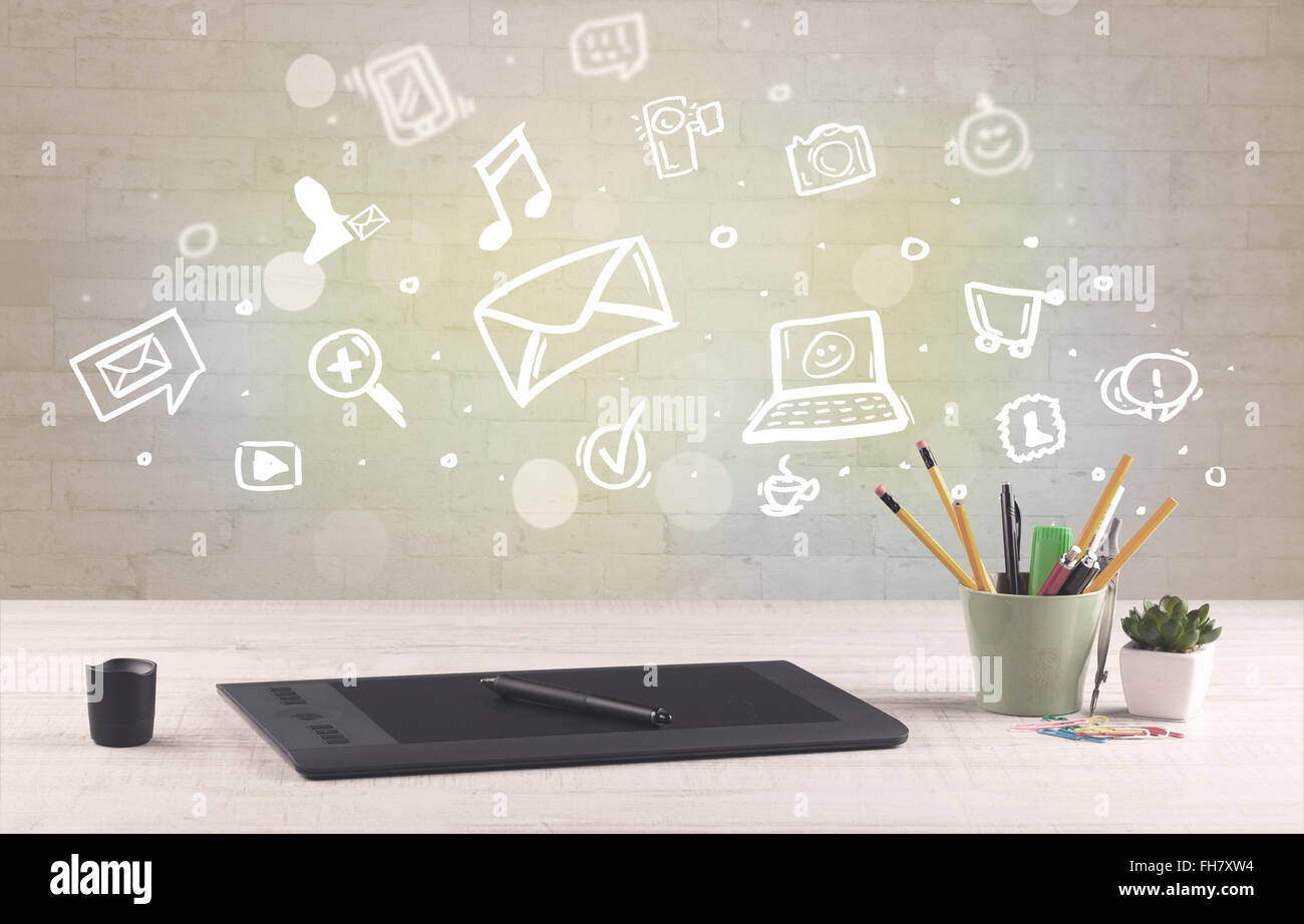 Office desk with communication icons Stock Photo - Alamy