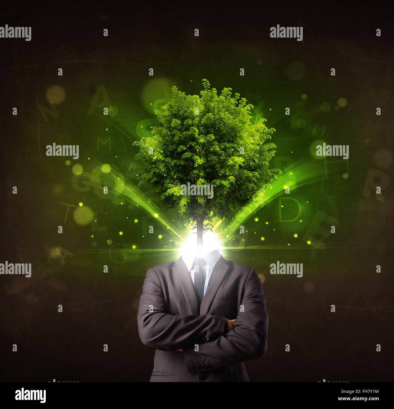 Man with green tree head concept Stock Photo - Alamy