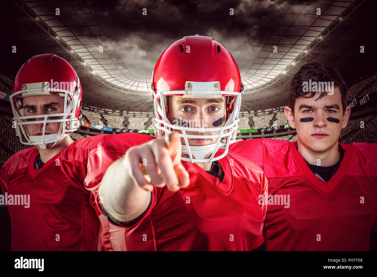 Composite image of american football team Stock Photo - Alamy