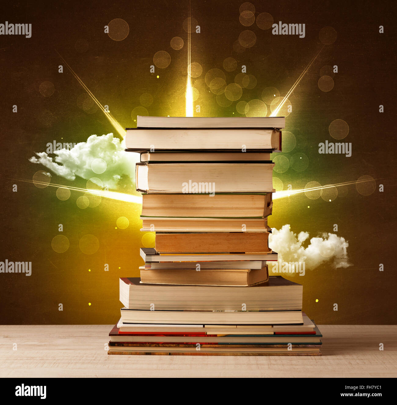 Magical books with ray of magical lights and colorful clouds Stock ...