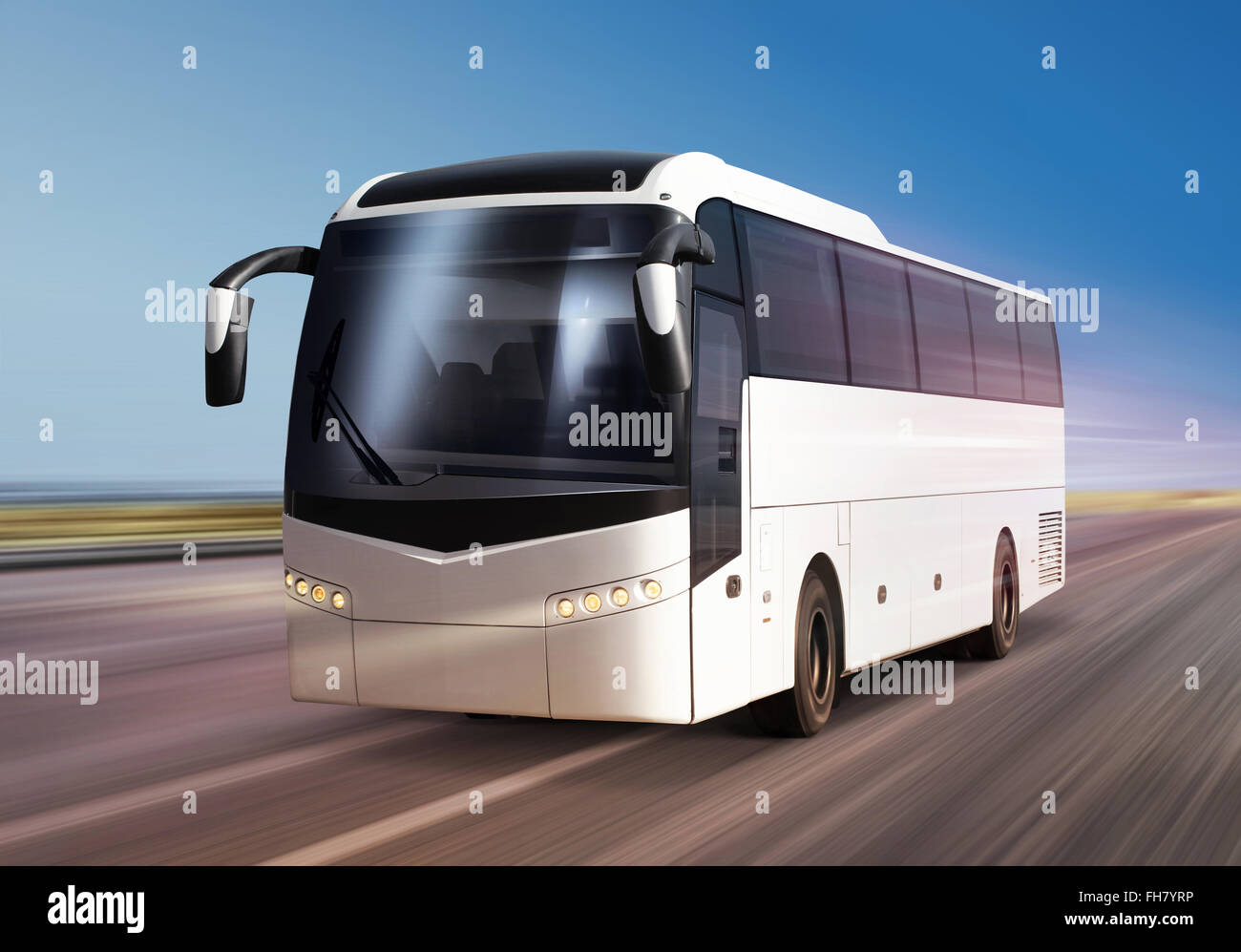 white bus moves on divided highway Stock Photo - Alamy