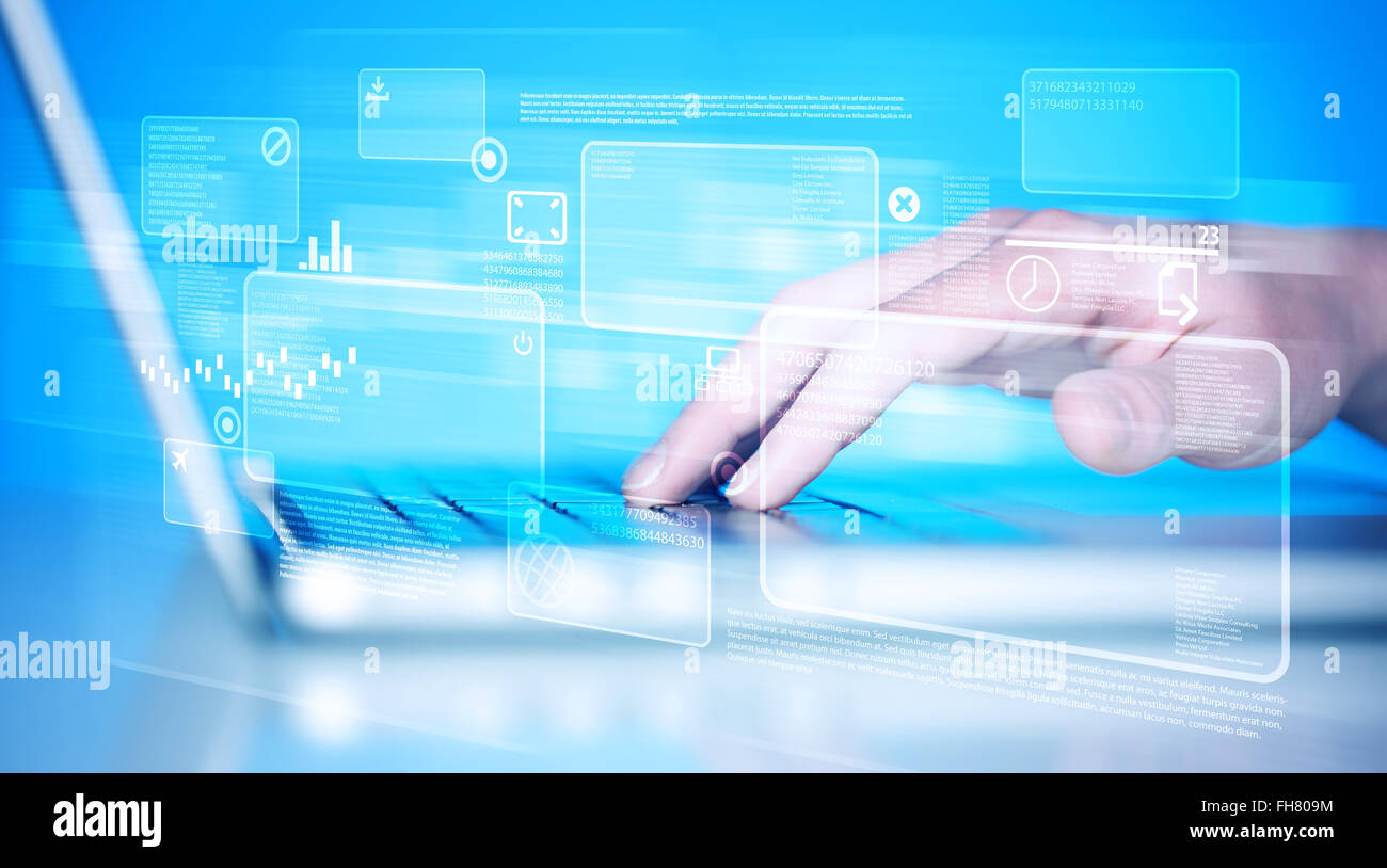 Hand touching keyboard with high tech buttons Stock Photo - Alamy