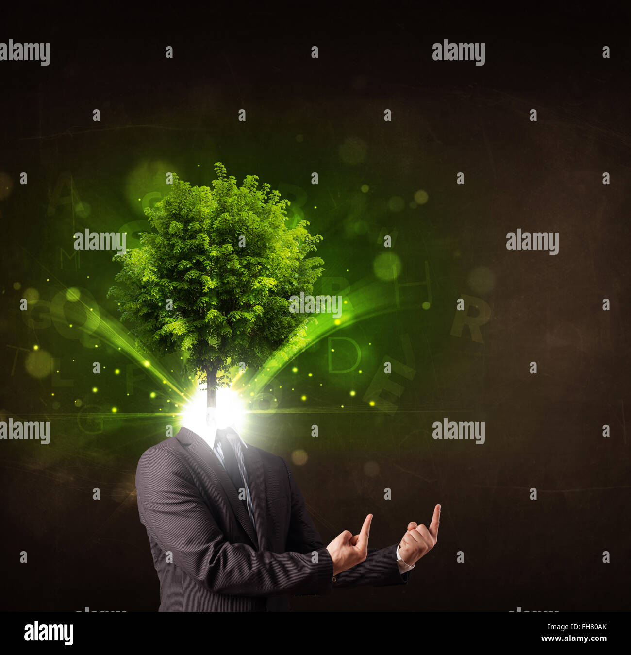 Man with green tree head concept Stock Photo - Alamy