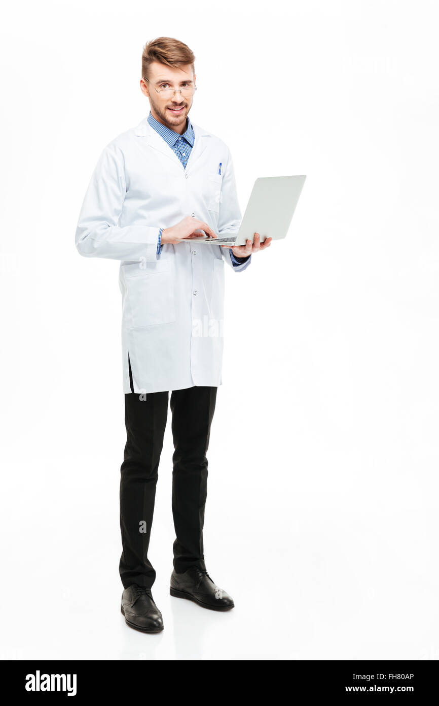 Doctor With Computer Looking At Camera Stock Photos & Doctor With ...