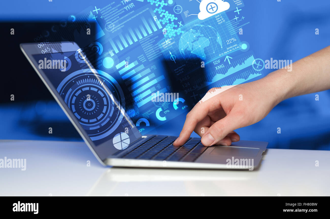 Modern notebook computer with future technology symbols Stock Photo - Alamy