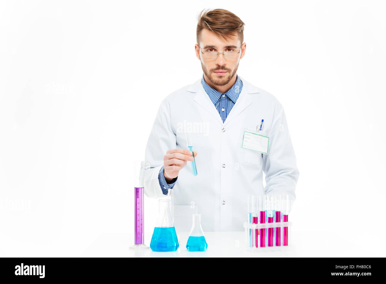 Scientist Pouring Chemicals In Laboratory High Resolution Stock ...