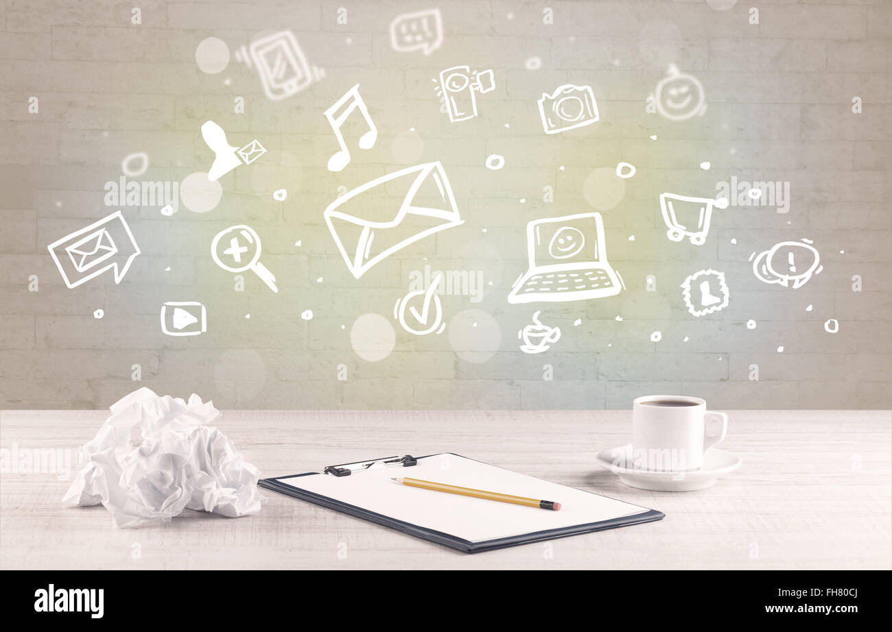 Office desk with communication icons Stock Photo - Alamy