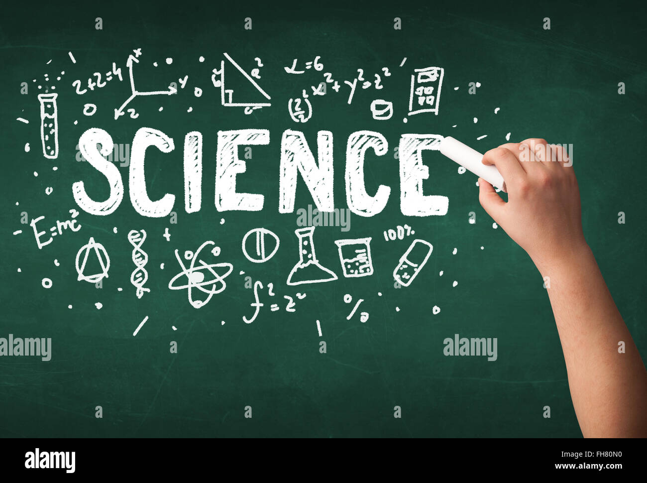 Mature science person drawing on board Stock Photo - Alamy