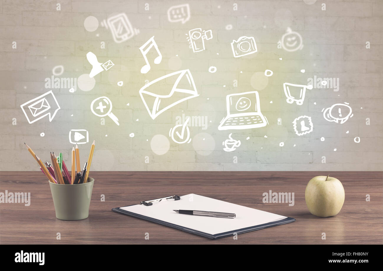 Office desk with communication icons Stock Photo - Alamy