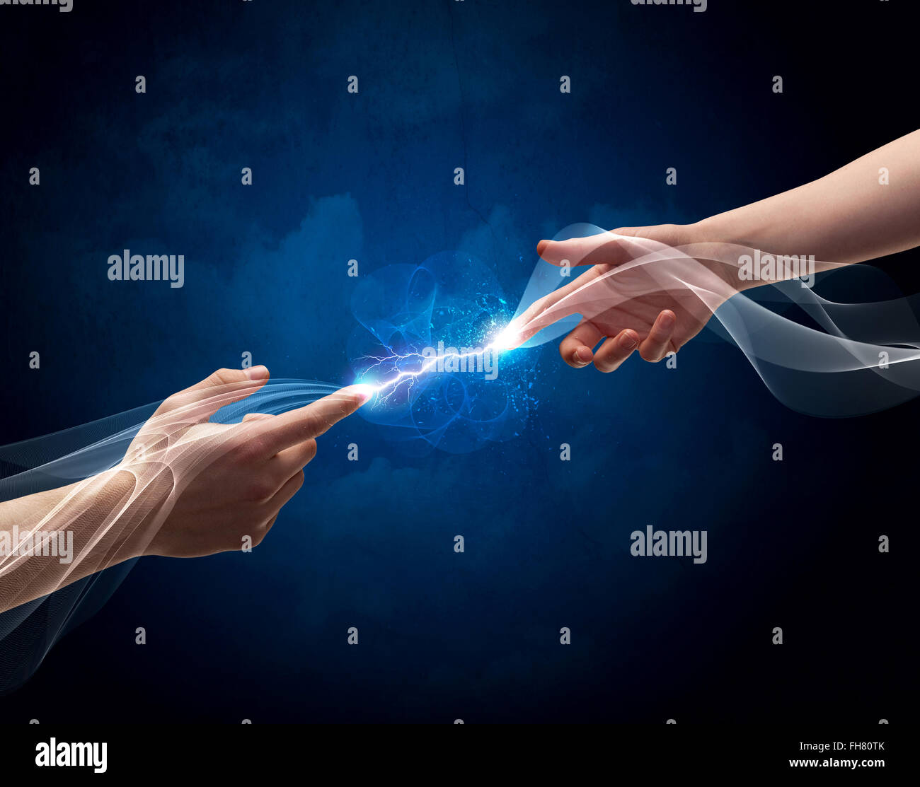 Hands connecting through fingers in space Stock Photo - Alamy