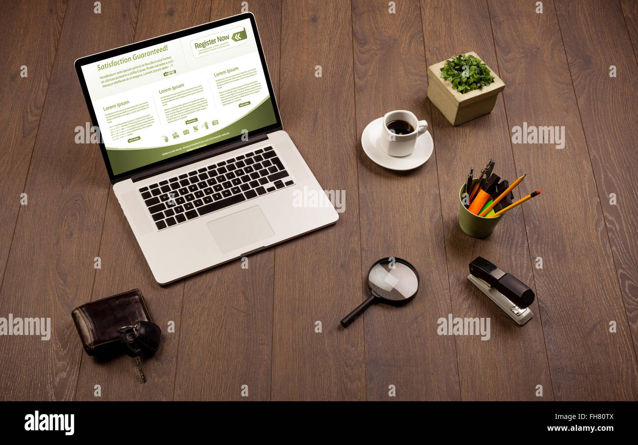 Business table with notebook computer and office accessories Stock ...