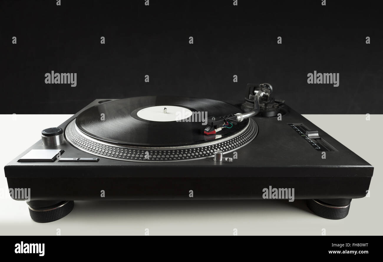 Turntable playing vinyl close up with needle on the record Stock Photo ...