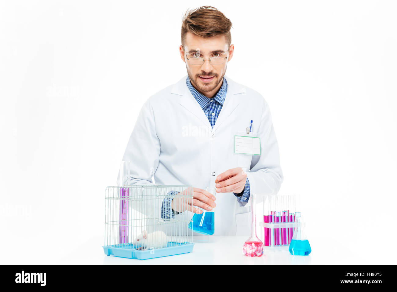 Scientist doing experiments with rat in a laboratory Stock Photo - Alamy