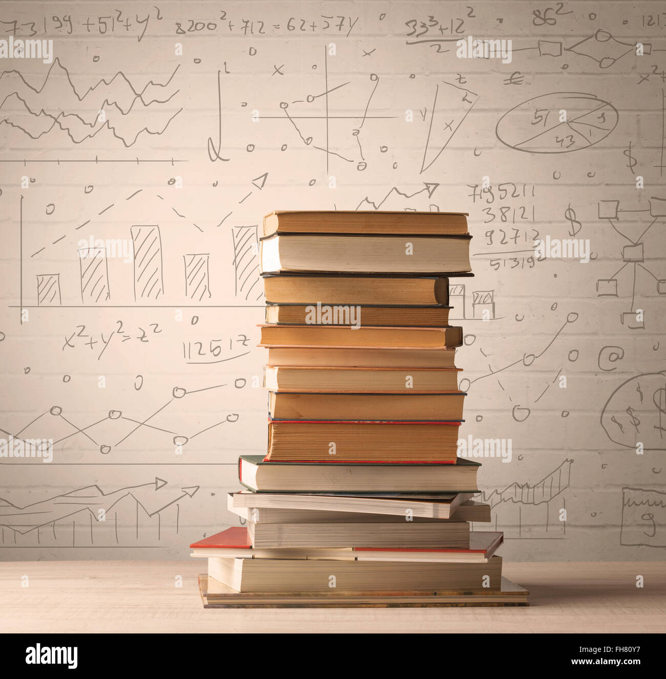 A pile of books with math formulas written in doodle style Stock Photo ...