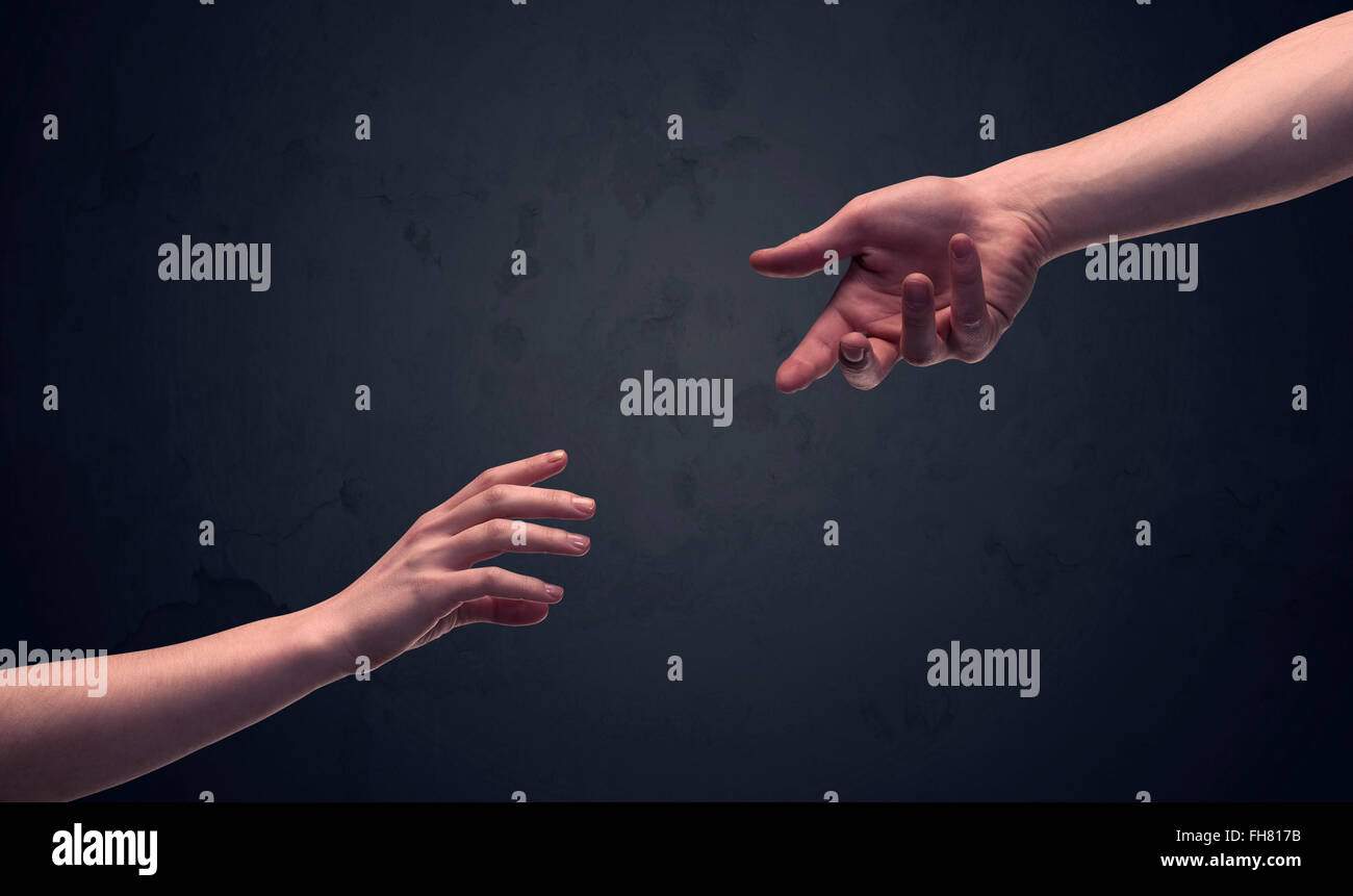 Hand about to touch another one Stock Photo - Alamy
