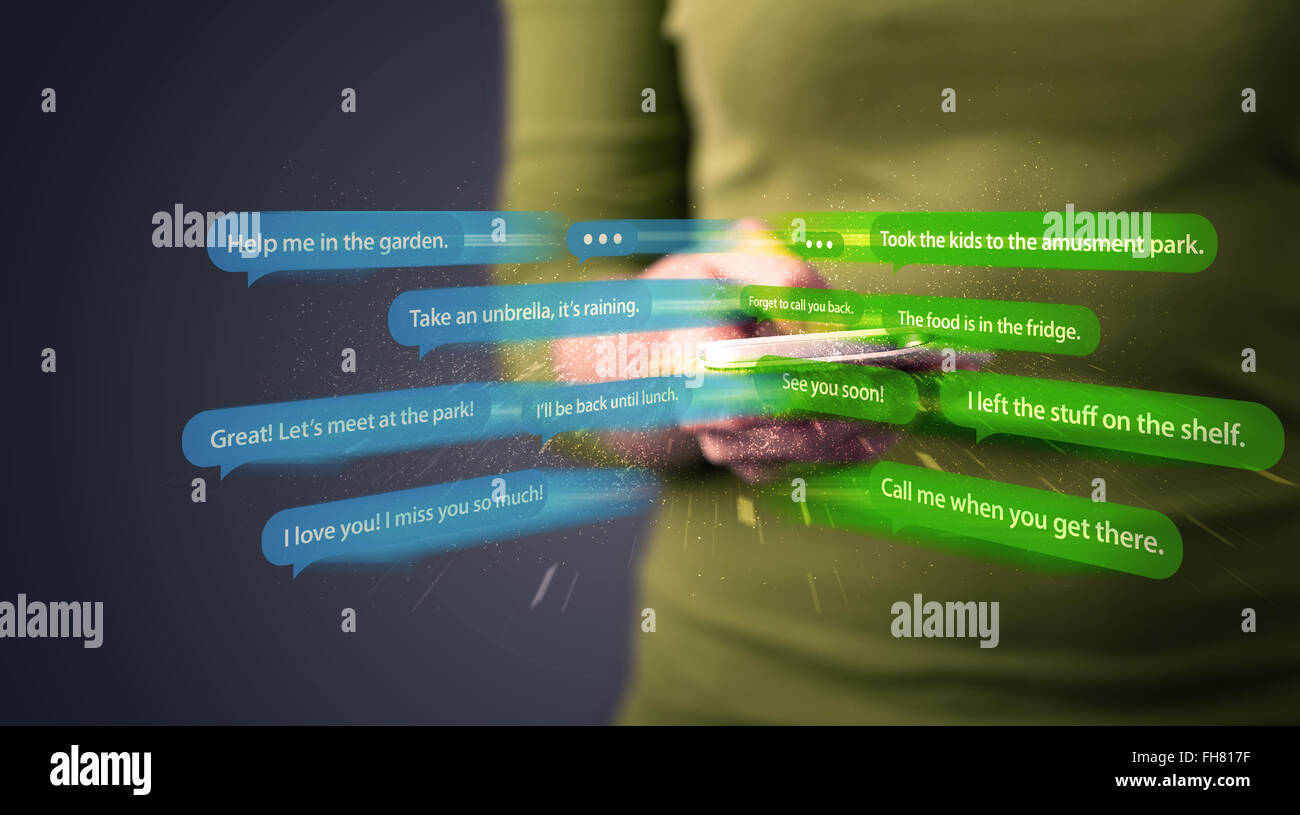 Young woman writing messages with smartphone Stock Photo - Alamy