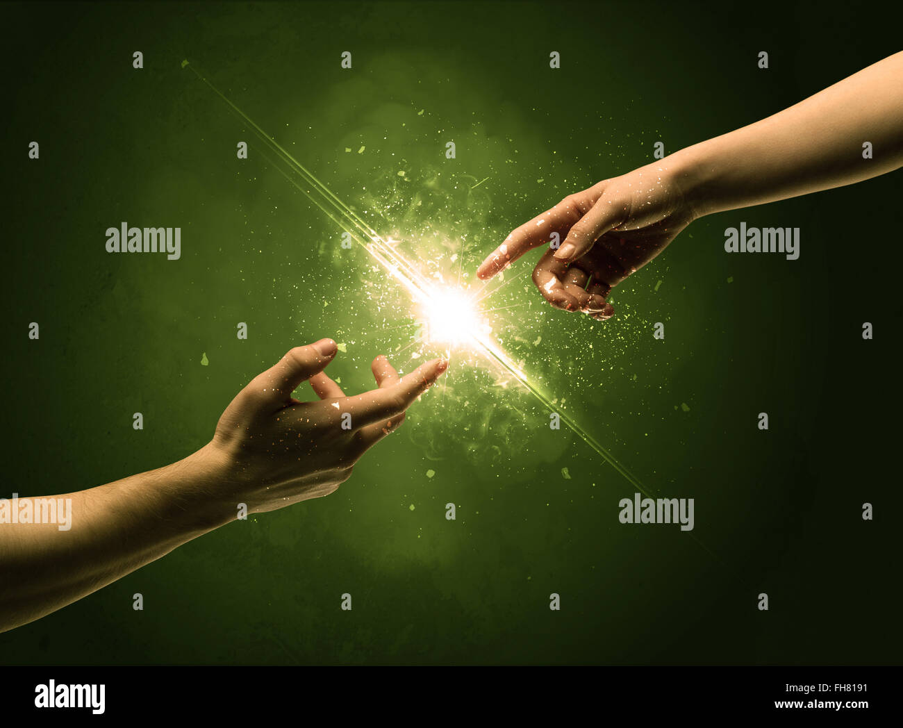 Touching arms lighting spark at fingertip Stock Photo - Alamy