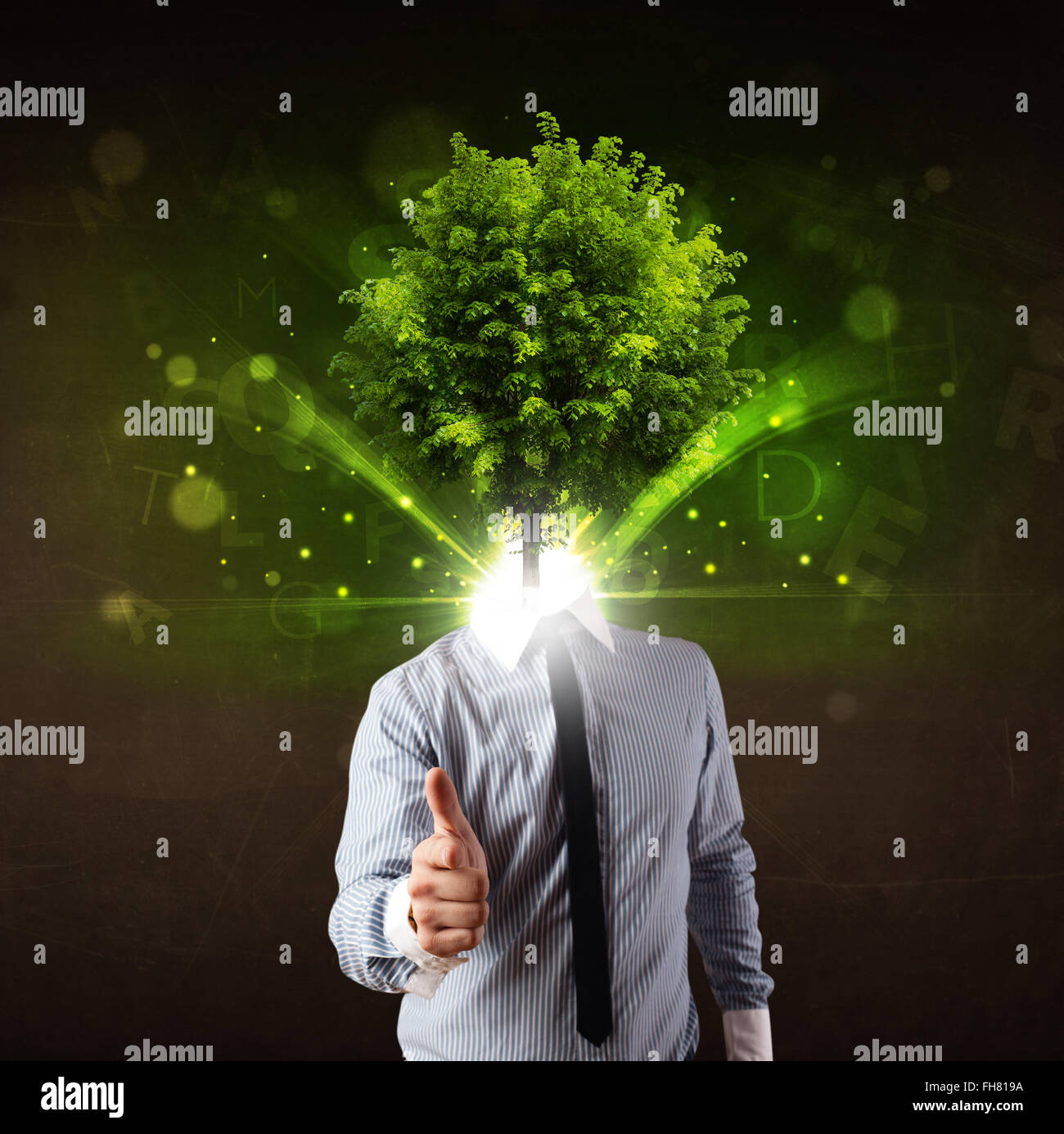 Man with green tree head concept Stock Photo - Alamy